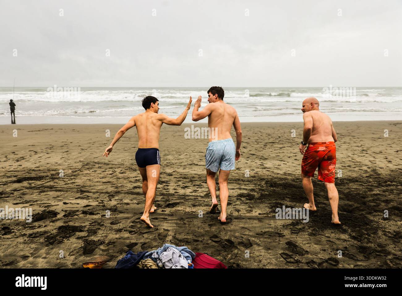From left, Evan George high-fives friend Mehmet Bilginsoy as Chad ...
