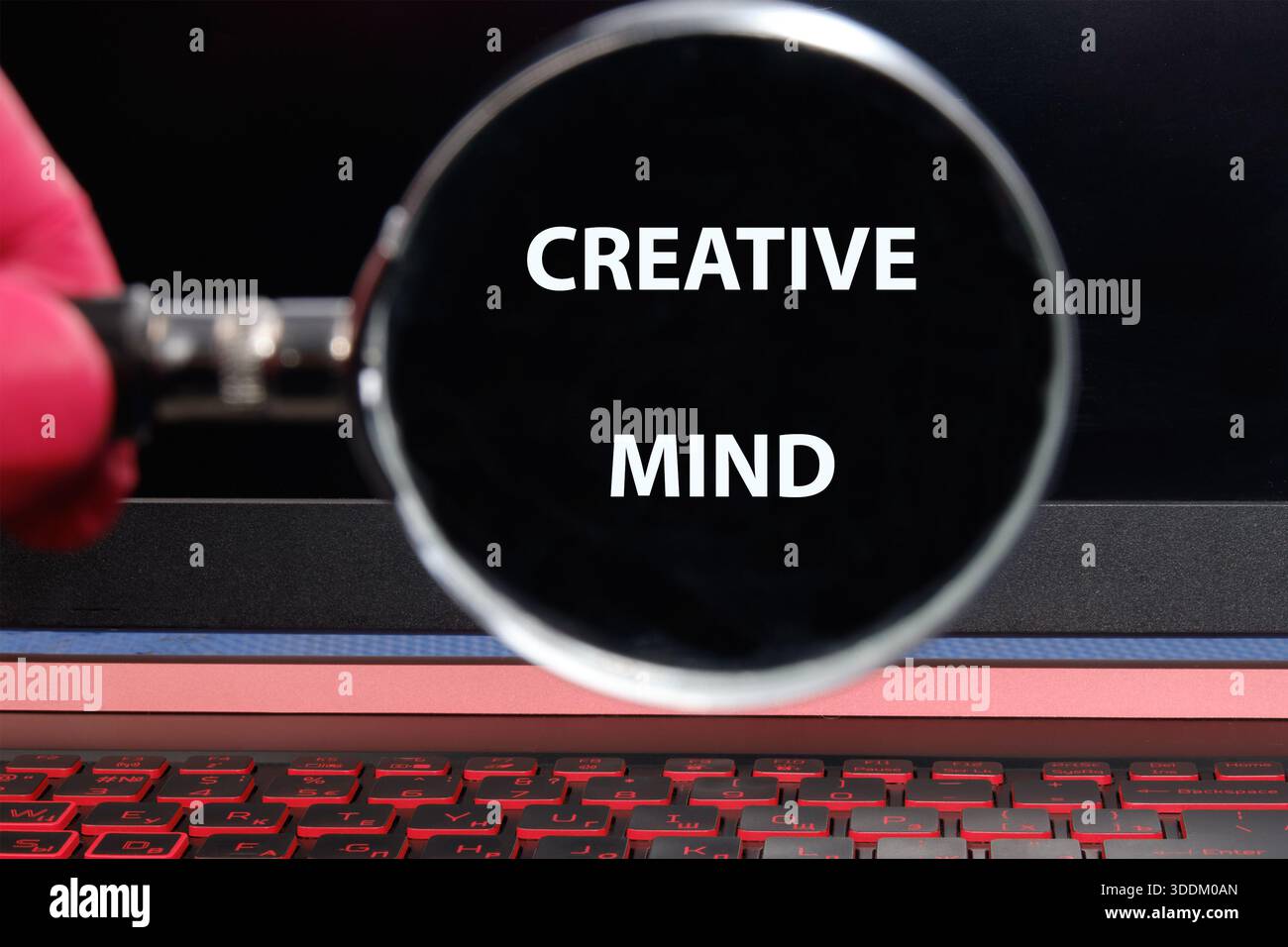 Magnifying glass focuses on mind hi-res stock photography and images ...