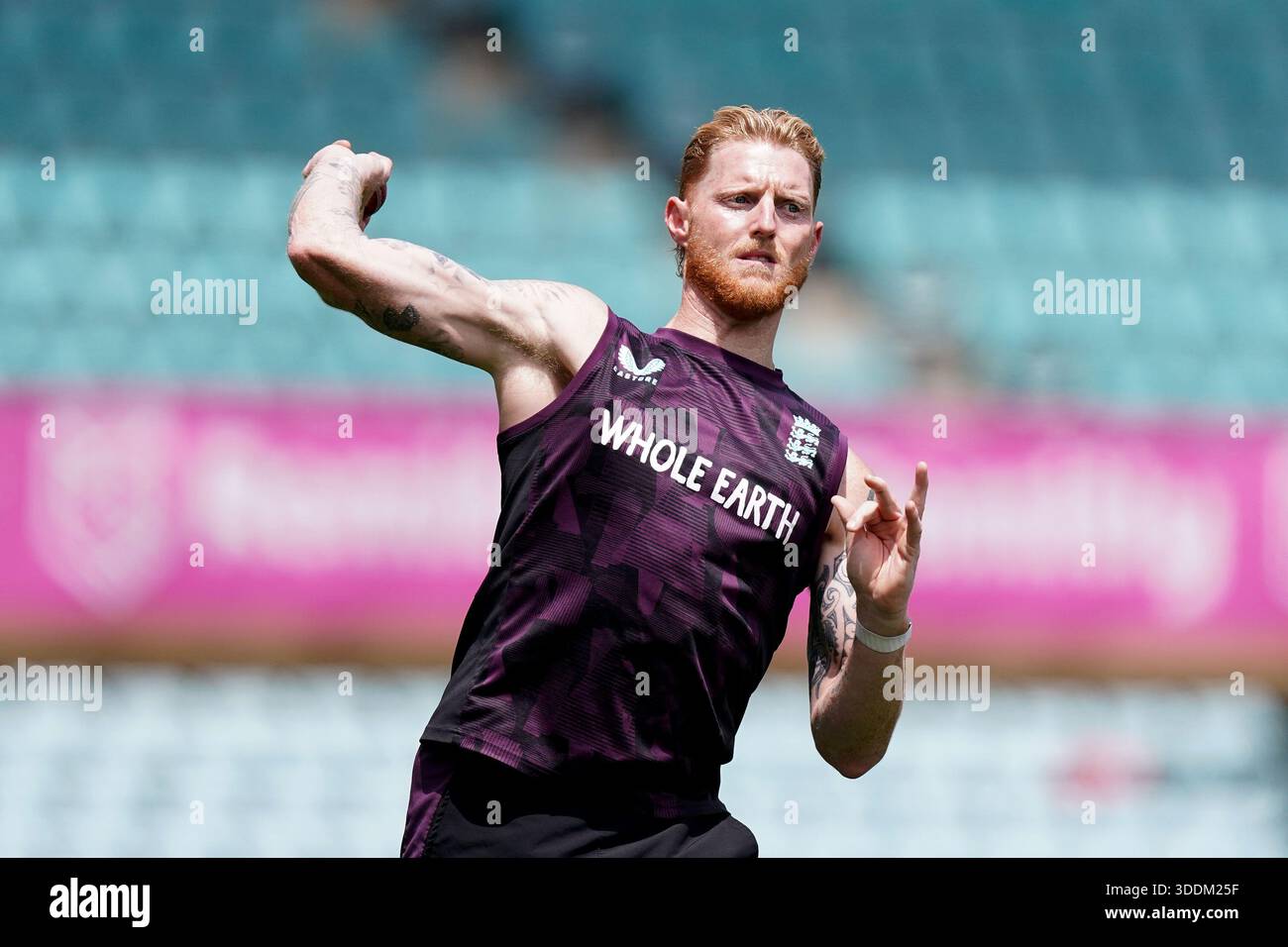 England’s Ben Stokes throws a ball during a nets session at the Sydney ...