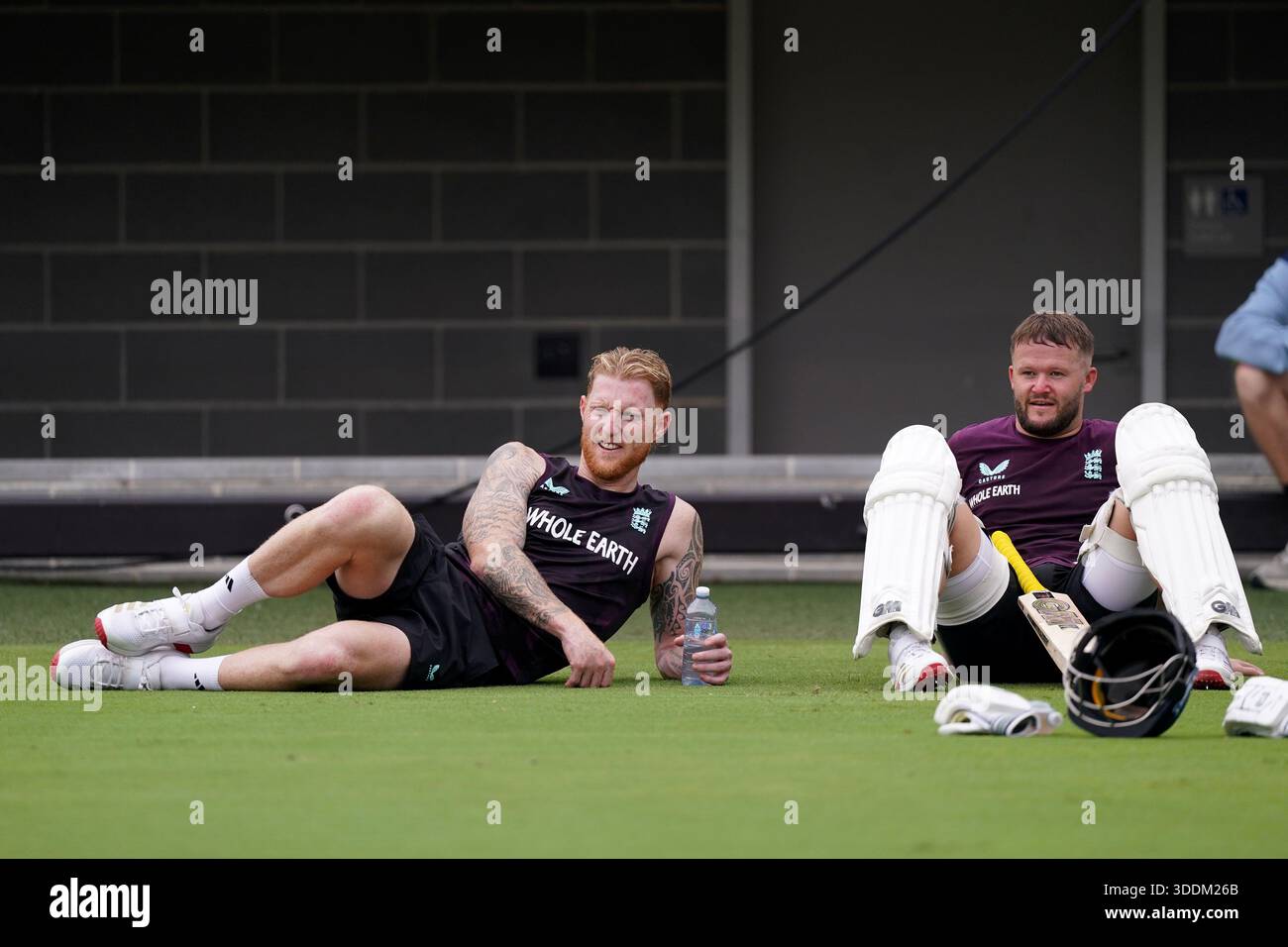 England’s Ben Stokes (left) and England’s Ben Duckett (right) share a ...
