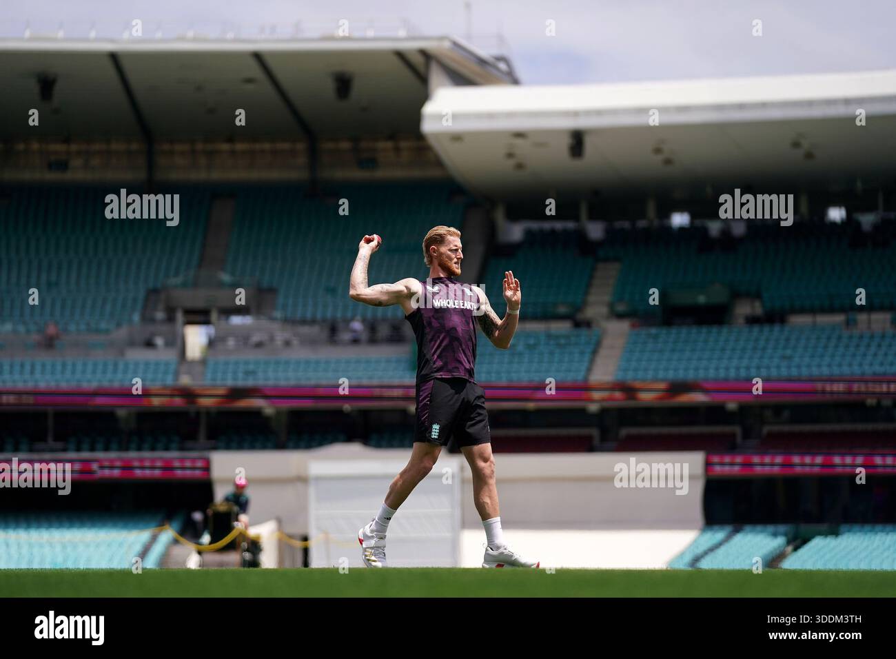 England’s Ben Stokes throws a ball during a nets session at the Sydney ...