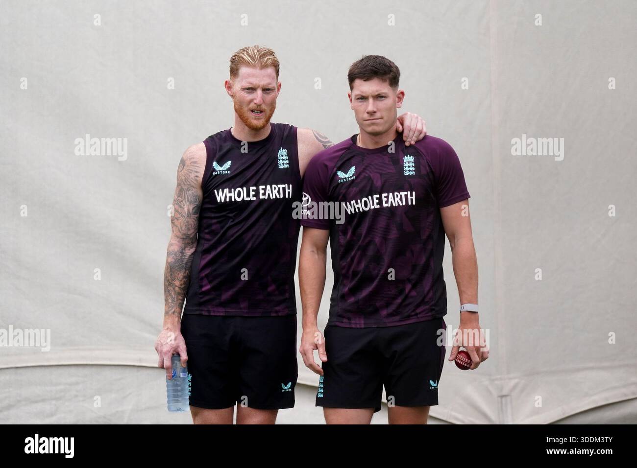 England’s Ben Stokes (left) puts his arm around England’s Matthew Potts ...