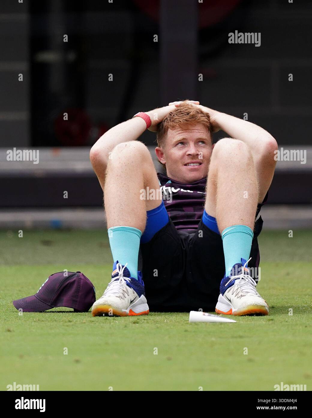 England’s Ollie Pope rests during a nets session at the Sydney Cricket ...