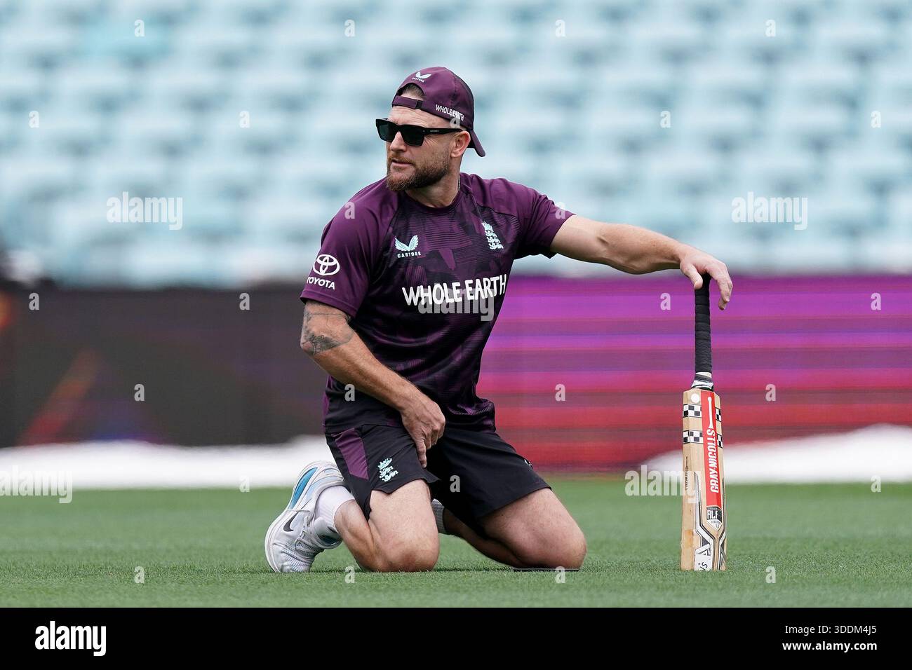 England head coach Brendan McCullum takes a knee during a nets session ...