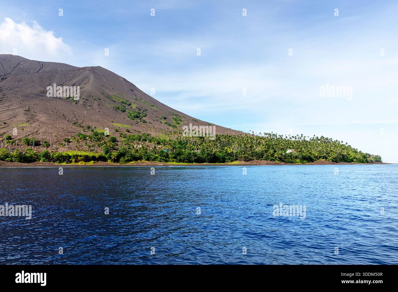 Dangerous Ruang island with A-type cone volcano, that rises from the ...
