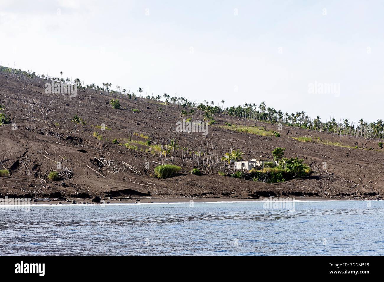Dangerous Ruang island with A-type cone volcano, that rises from the ...
