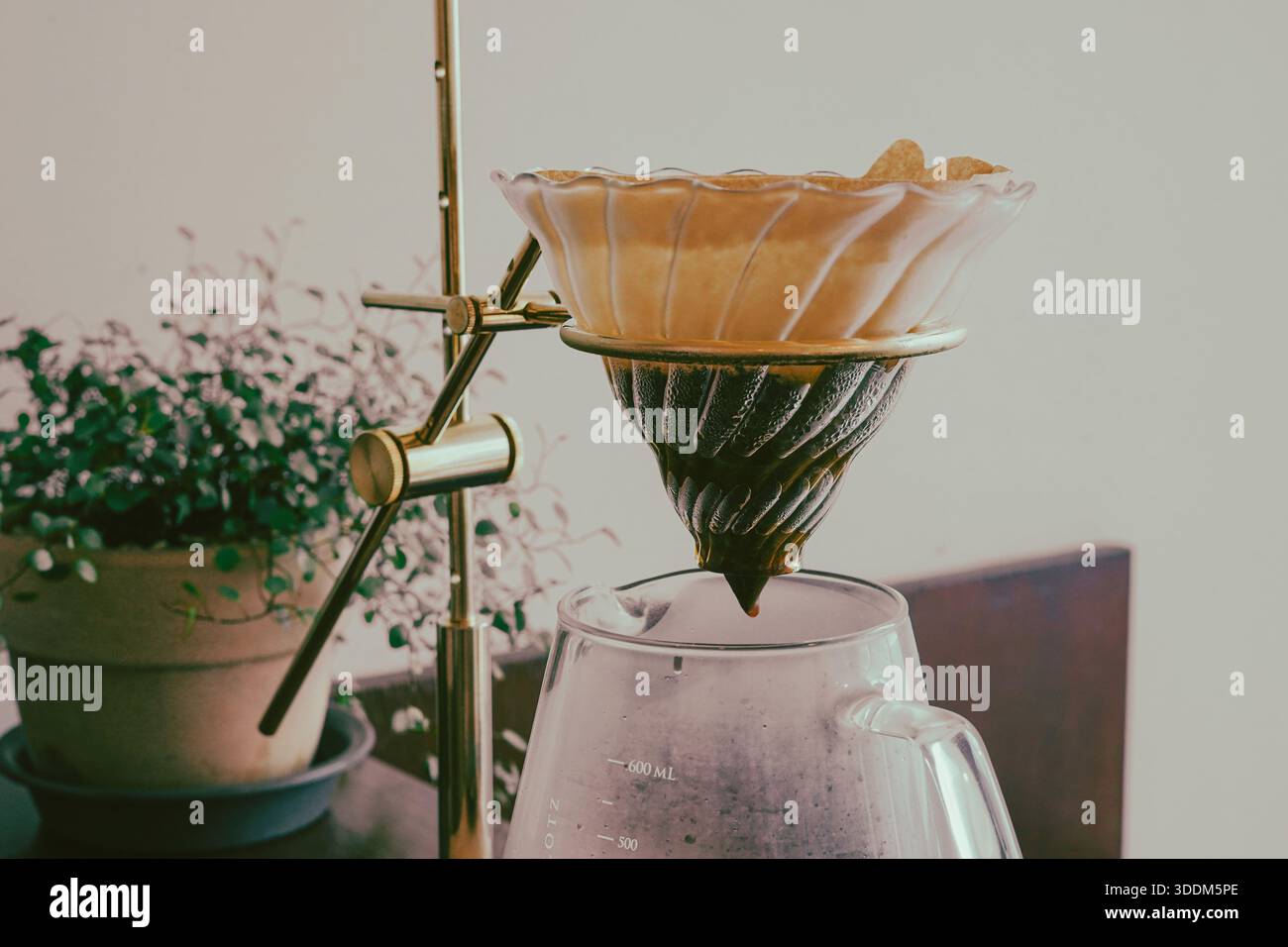 Liquid dripping through filter hi-res stock photography and images - Alamy