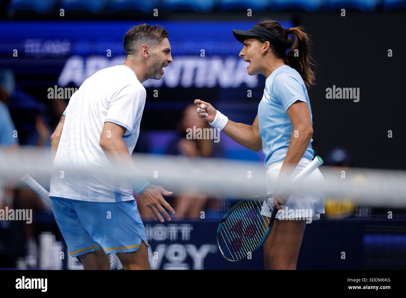 Maria Lourdes Carle and Guido Andreozzi of Argentina celebrate a point ...