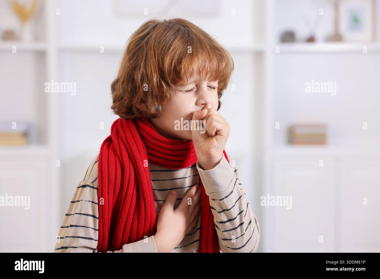 Little boy coughing at home. Cold symptom Stock Photo - Alamy