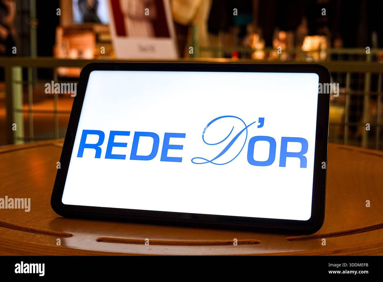 In this photo illustration, the logo of Rede D'Or is displayed on the ...