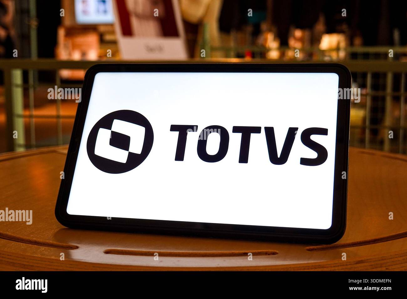 In this photo illustration, the logo of TOTVS is displayed on the ...