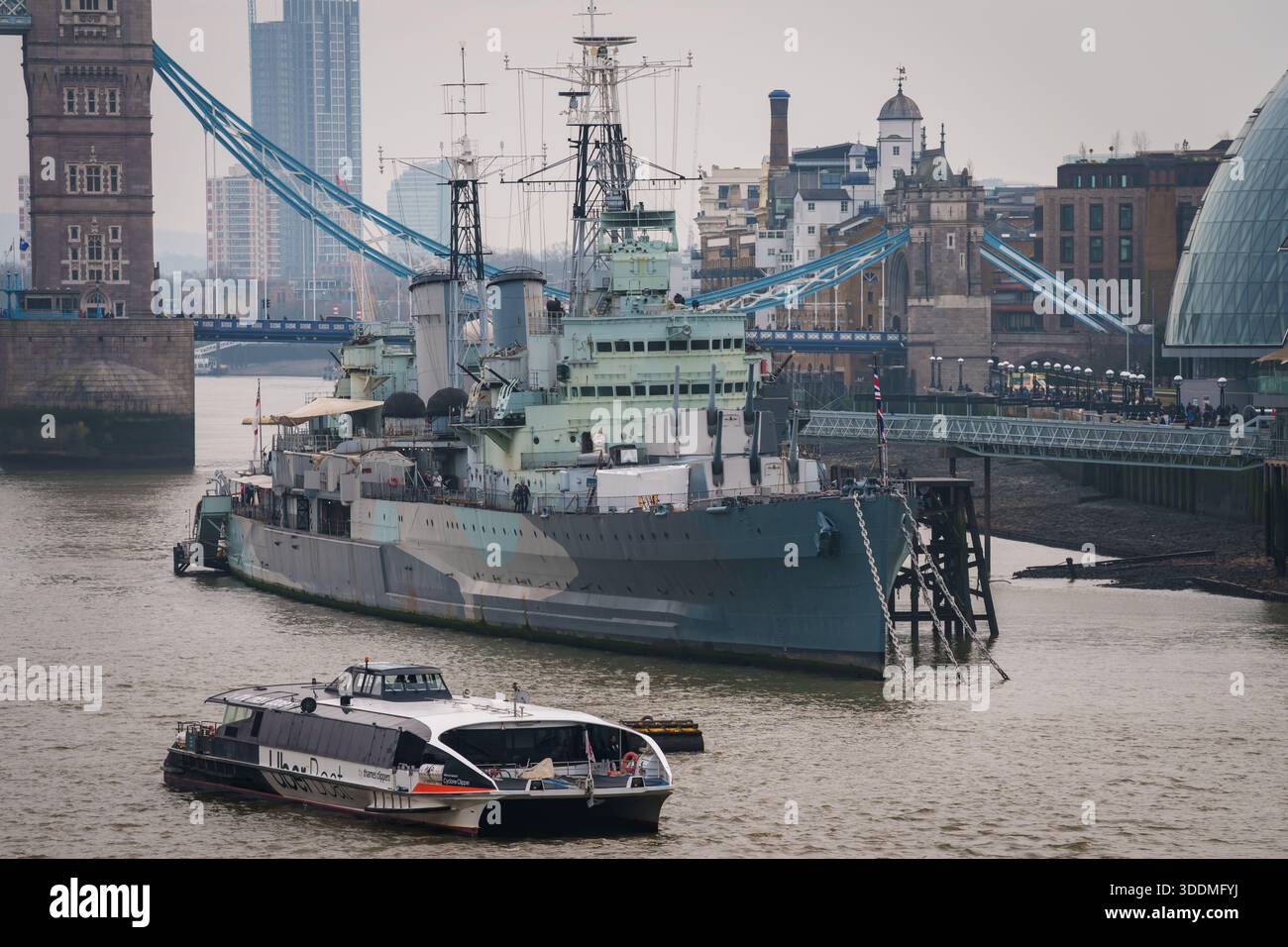 LONDON, UK. 15th February 2025. Tower Bridge and HMS Belfast Royal Navy ...