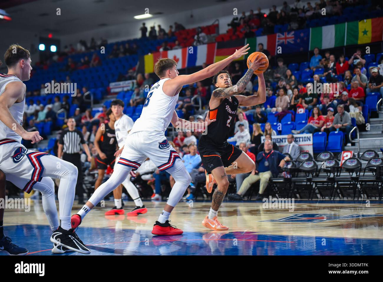 UTSA guard Austin Nunez (2) takes a shot over Florida Atlantic center ...