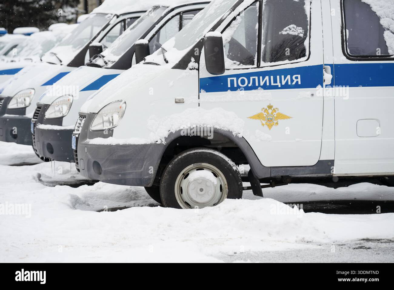 Russian police cars in winter . Text in Russian: Police Stock Photo - Alamy
