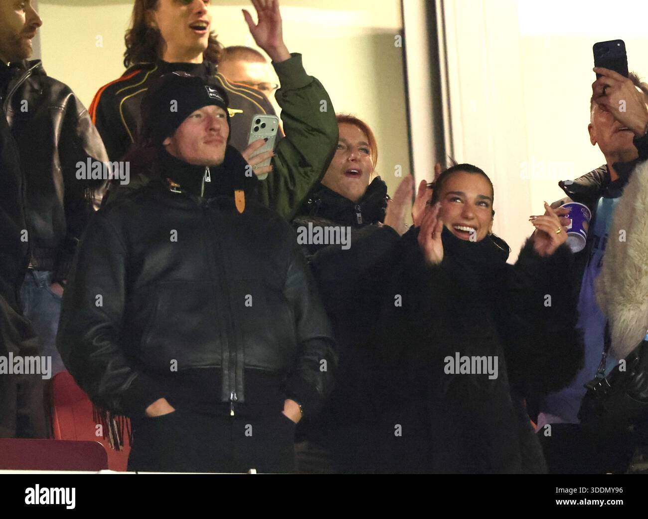 Dua Lipa and Callum Turner at the Arsenal v Aston Villa EPL match, at ...