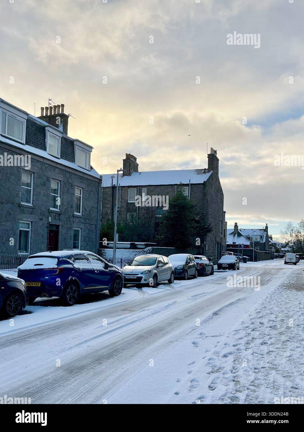 Snow covers roads and cars in Aberdeen. Weather warnings for snow have ...