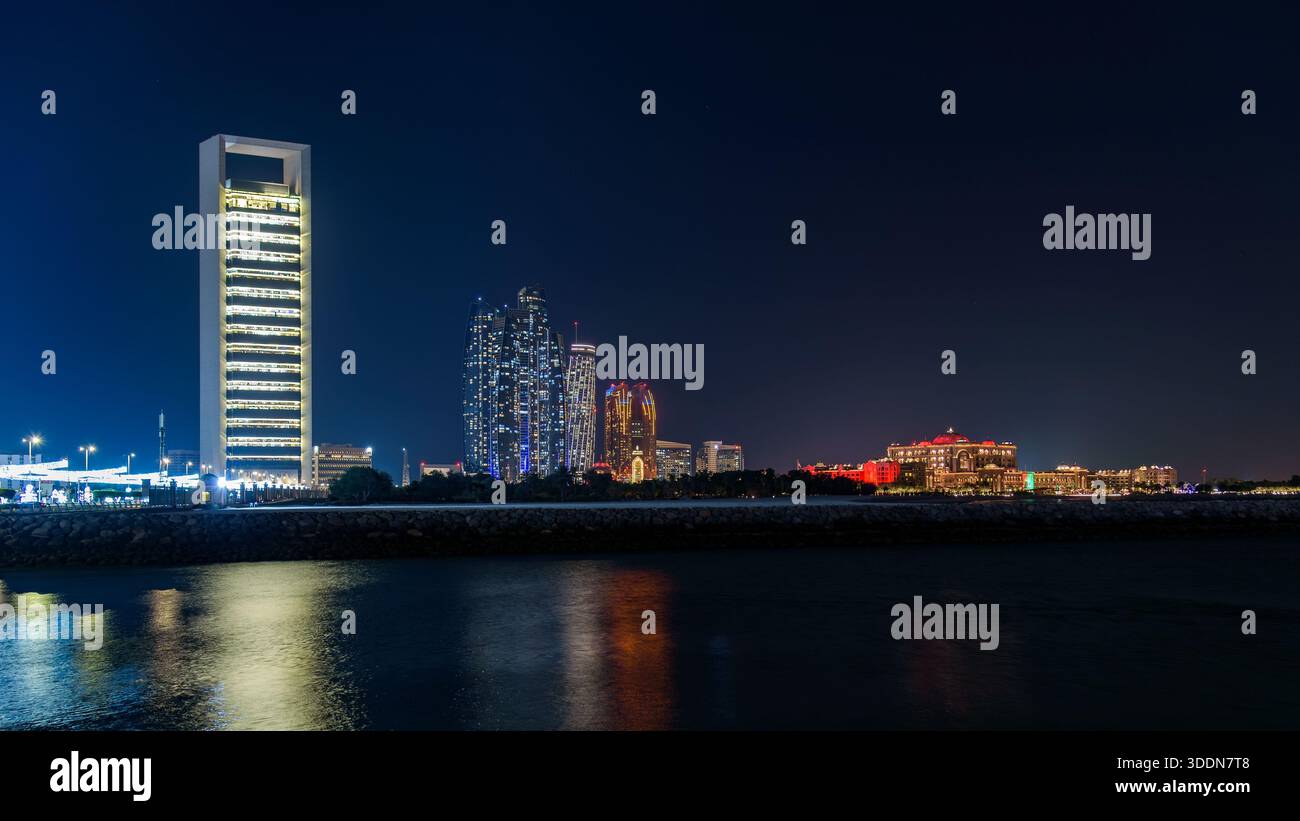 Abu Dhabi, UAE - November 24, 2025: The illuminated skyline glows ...