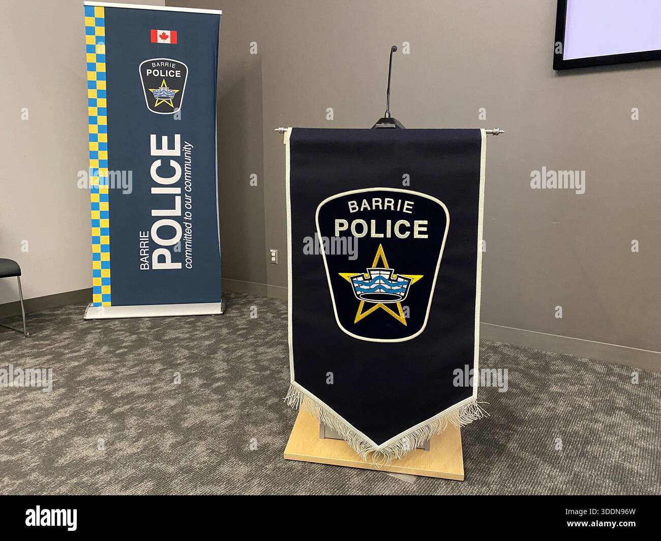 The Barrie Police Service logos are shown ahead of a press conference ...