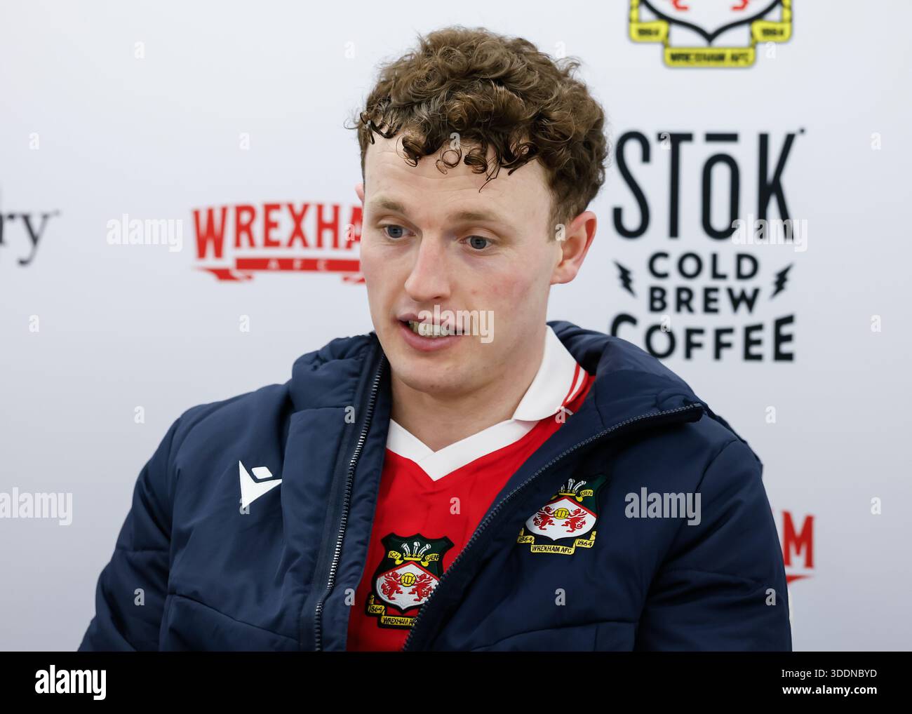 Wrexham’s Nathan Broadhead speaks with the media at a post match press ...