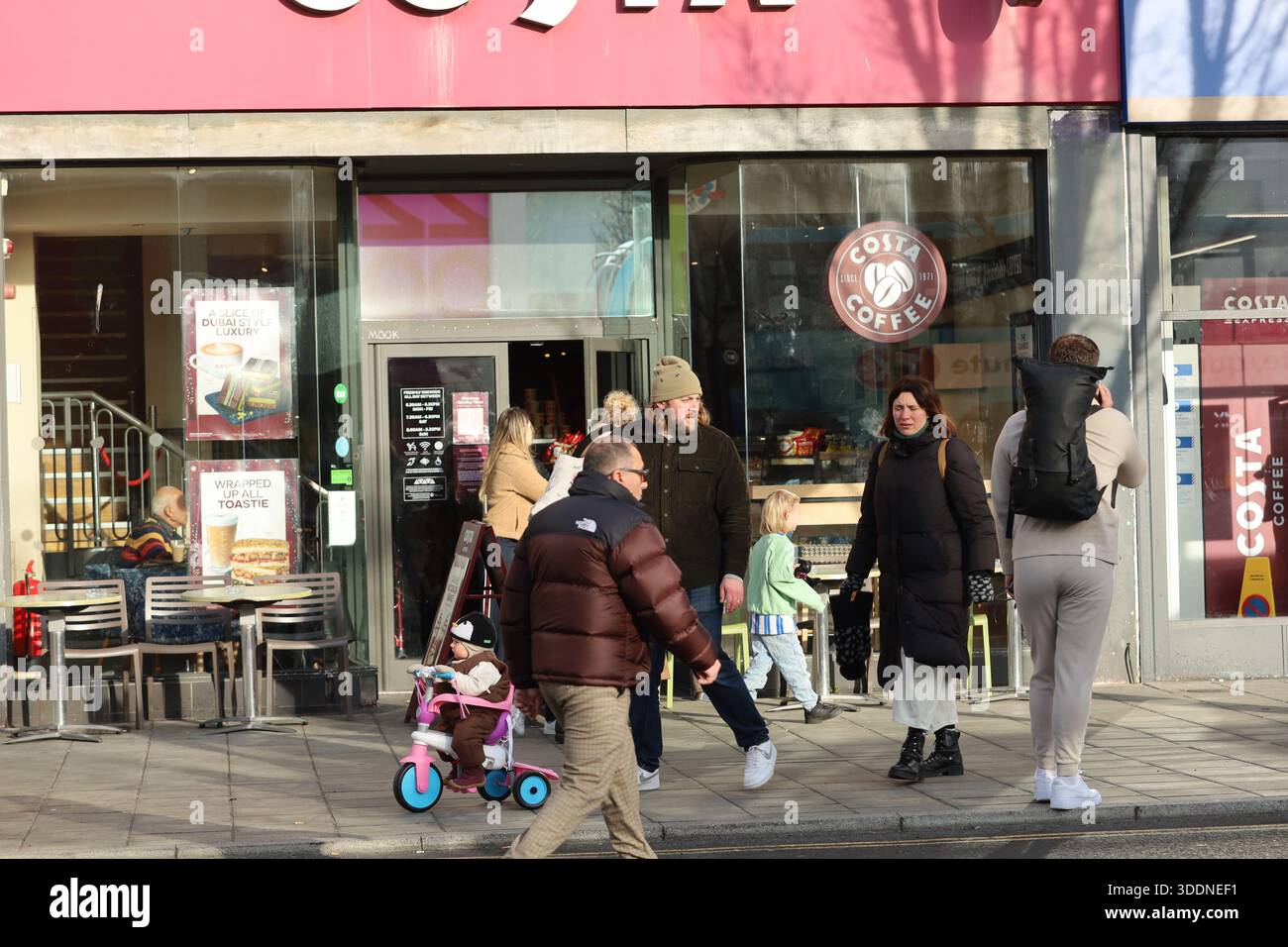 Brighton, UK. 02 January 2026. Some people walk outside a Costa Coffee ...