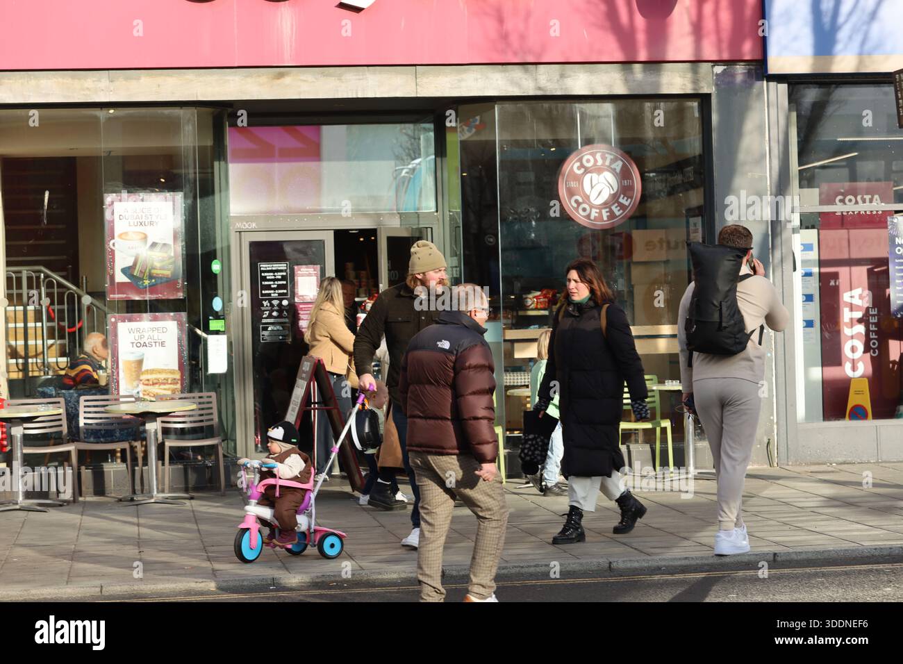 Brighton, UK. 02 January 2026. Some people walk outside a Costa Coffee ...