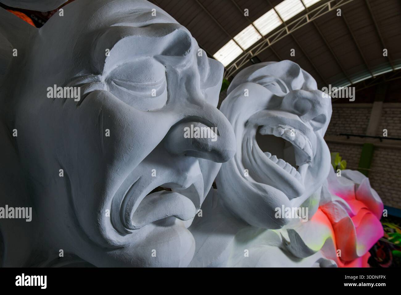 Master artisan Miguel Mejia works on the float “Encanto”, set to parade ...