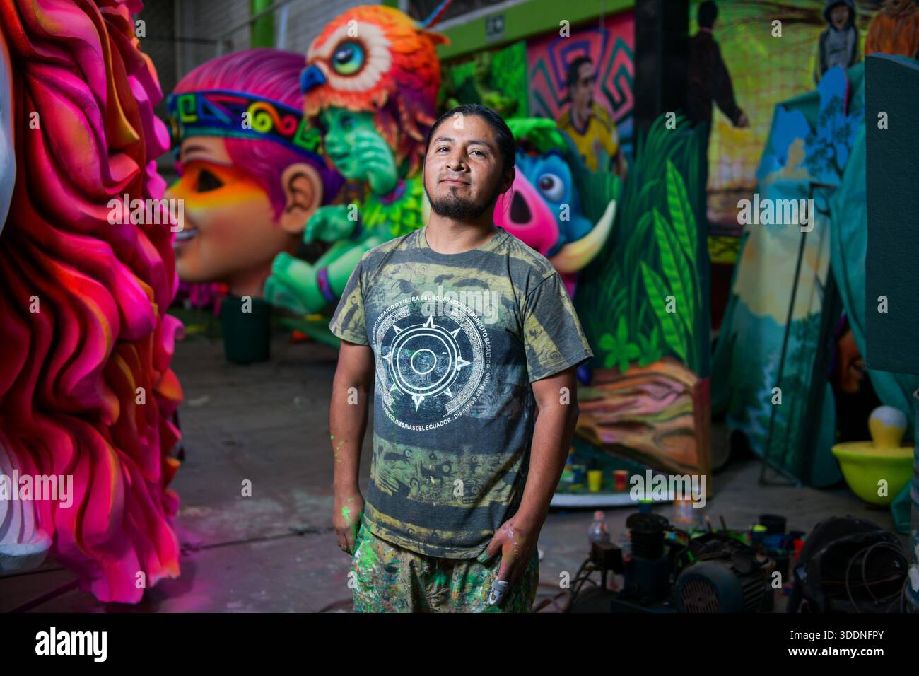 Master artisan Alvaro Cordoba works on the float “Encanto”, set to ...