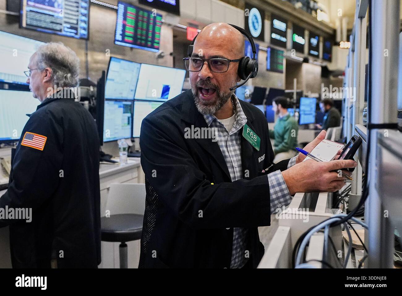 Options trader Steven Rodriguez works on the floor of the New York ...