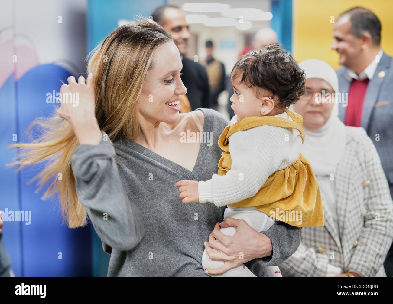 American actress and film producer Angelina Jolie carries a Palestinian ...