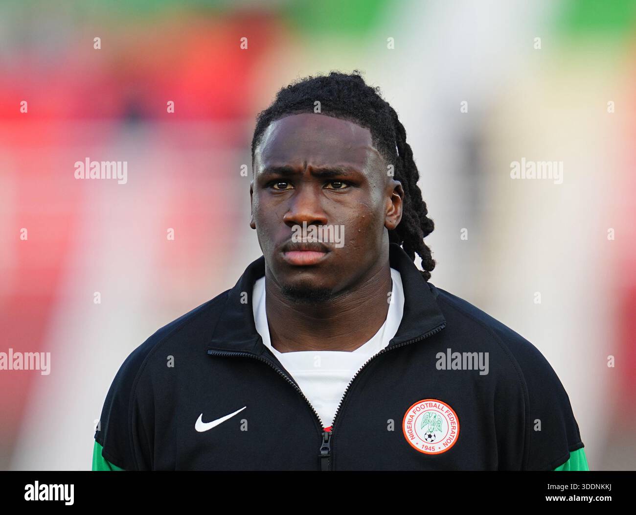 December 30 2025: Calvin Chinedu Bassy of Nigeria looks on during a ...