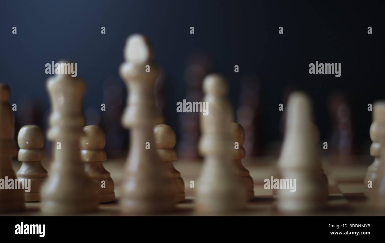 Animated sequence showing chess pieces on revolving board, capturing ...