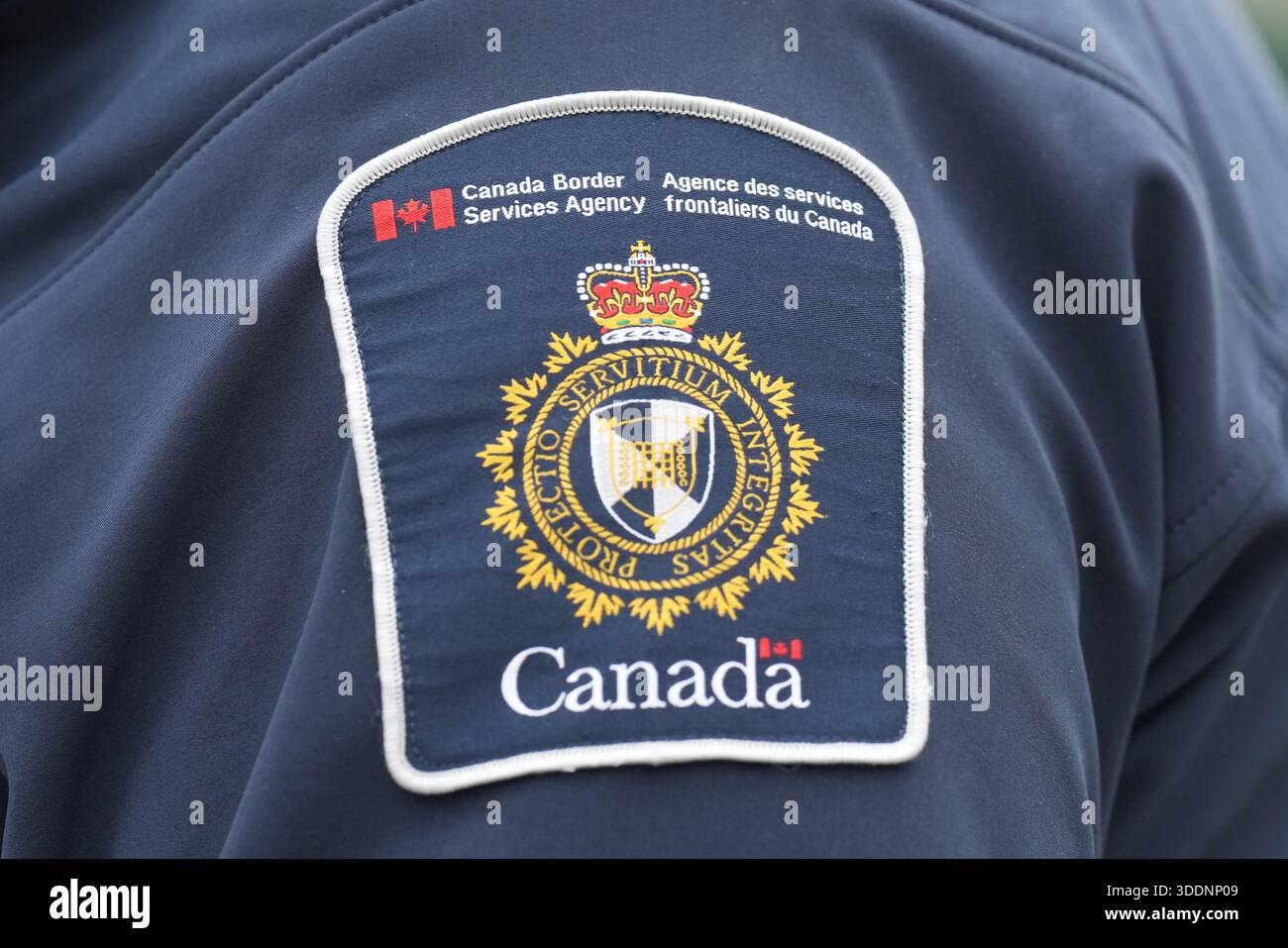 A Canada Border Services Agency patch is seen on the shoulder of a CBSA ...