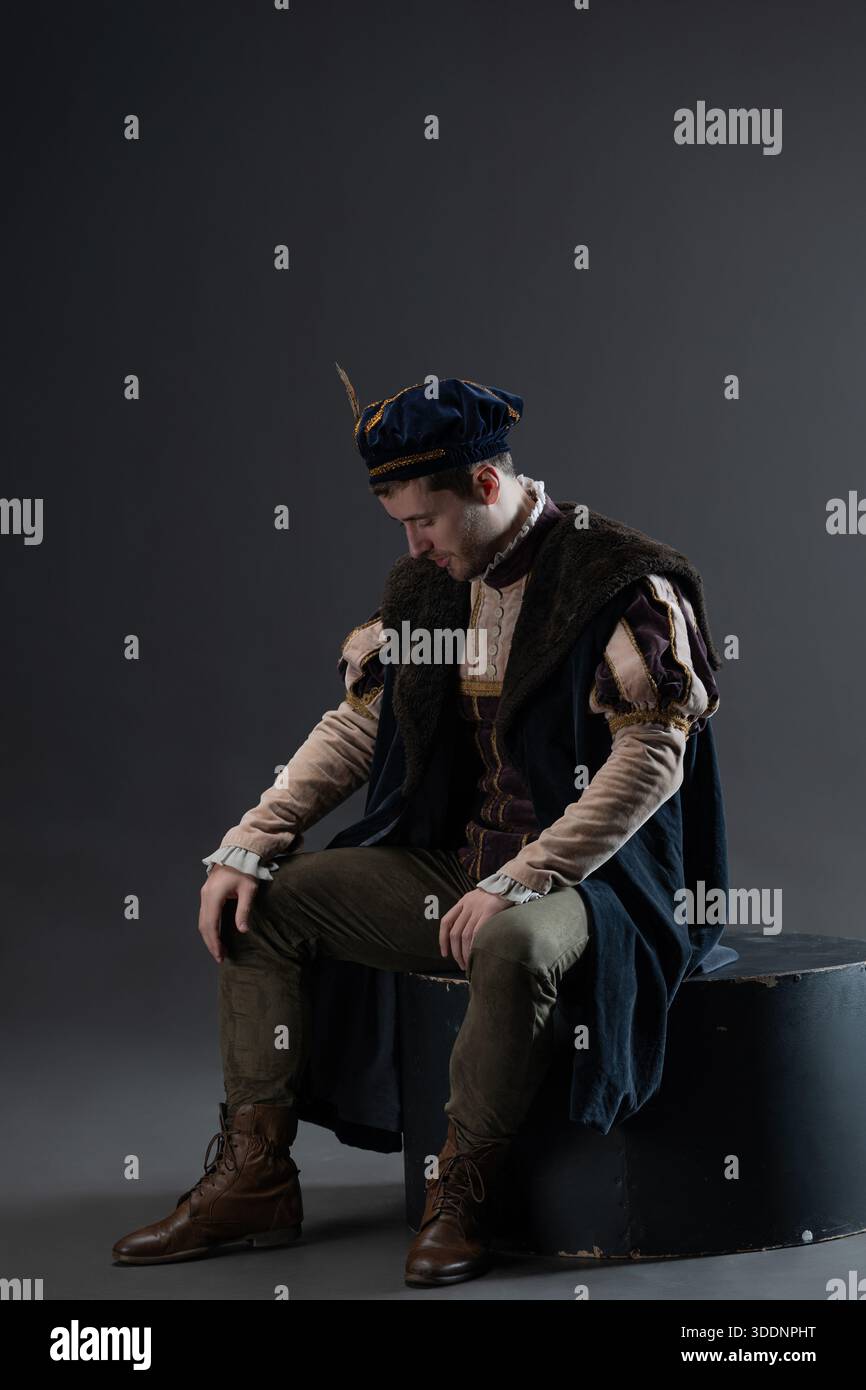 Cinematic romantic hero from medieval setting wearing rich brocade ...