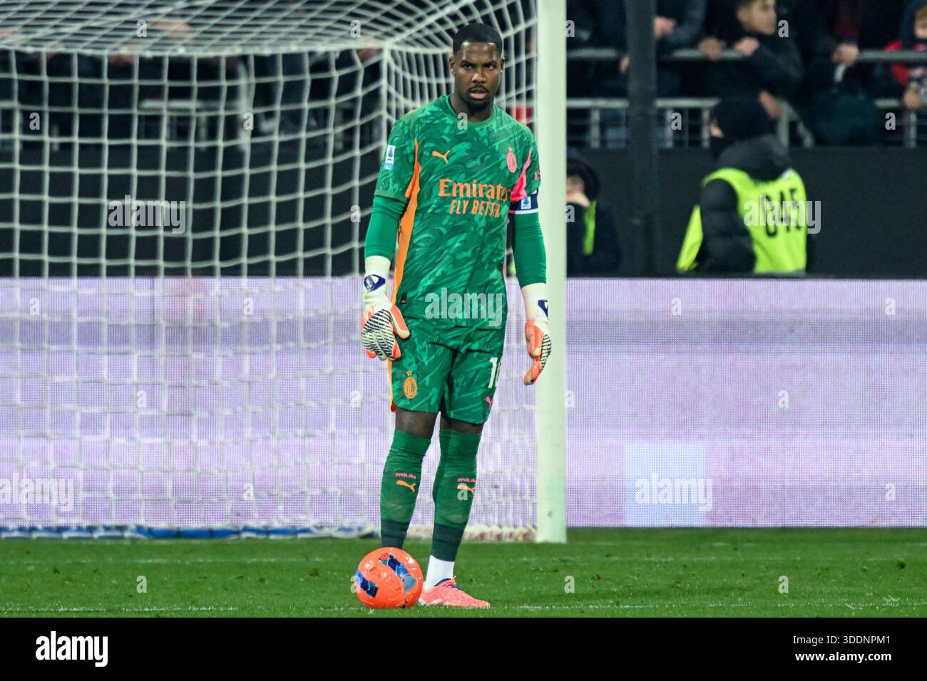 AC Milan's Mike Maignan in action during the Serie A soccer match ...