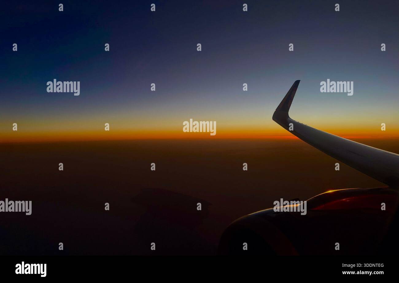 Flight over the sea during golden hour hi-res stock photography and ...