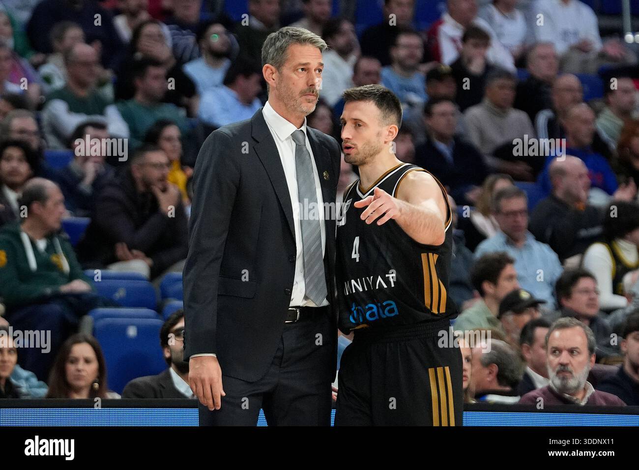Dubai Basketball's coach Jurica Goleman with his player Aleksa ...