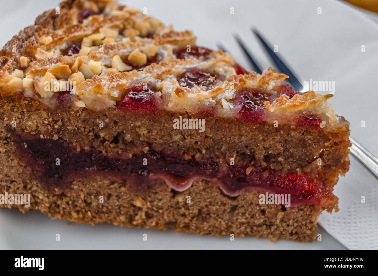A slice of Linzer Torte (Linzer tart), a traditional Austrian pastry, a ...