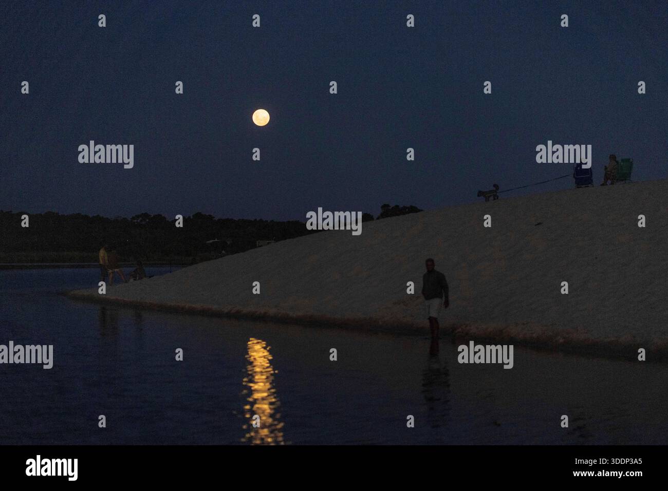 A super wolf moon rises over Pando stream in El Pinar, the Canelones ...