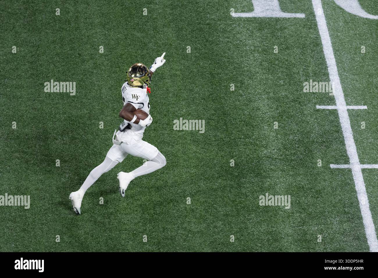 Wake Forest defensive back Koredell Bartley (35) runs back a kickoff ...