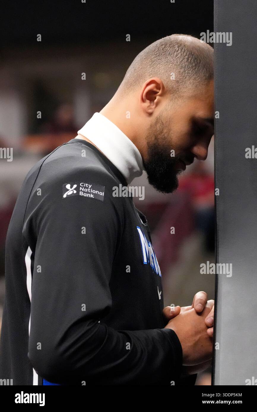Orlando Magic guard Jalen Suggs takes a moment before the game against ...