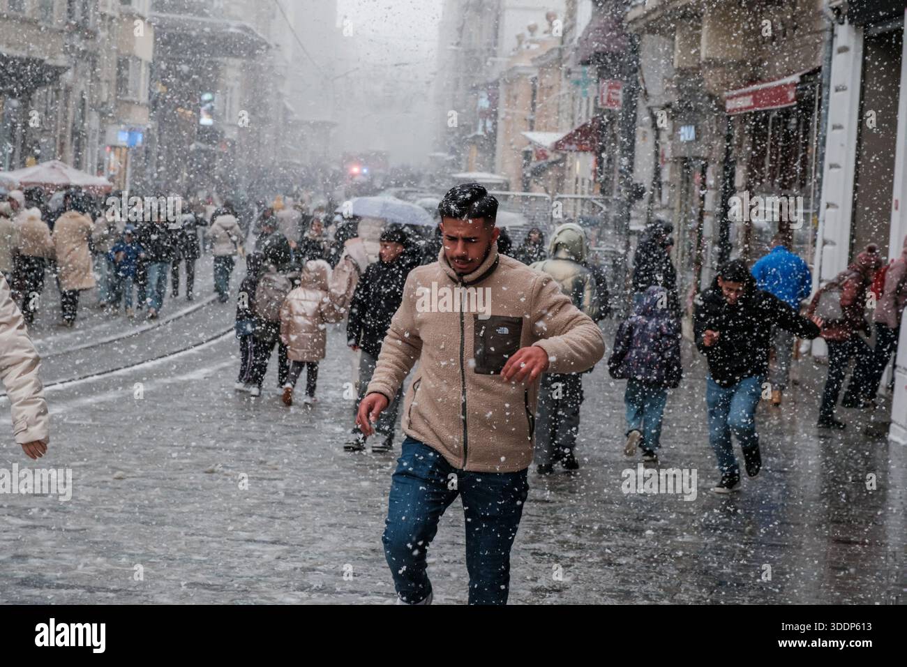 People seen walking in heavy snowfall. On the first day of the new year ...