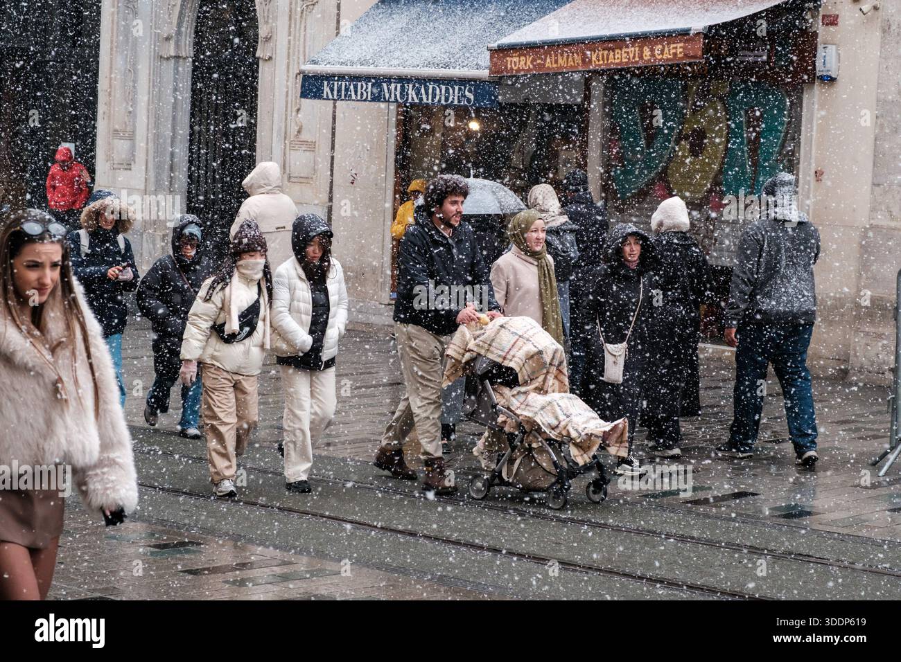 People seen walking in heavy snowfall. On the first day of the new year ...