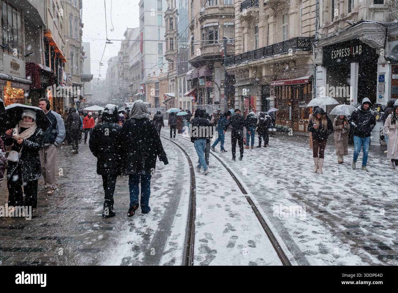 People seen walking in heavy snowfall. On the first day of the new year ...