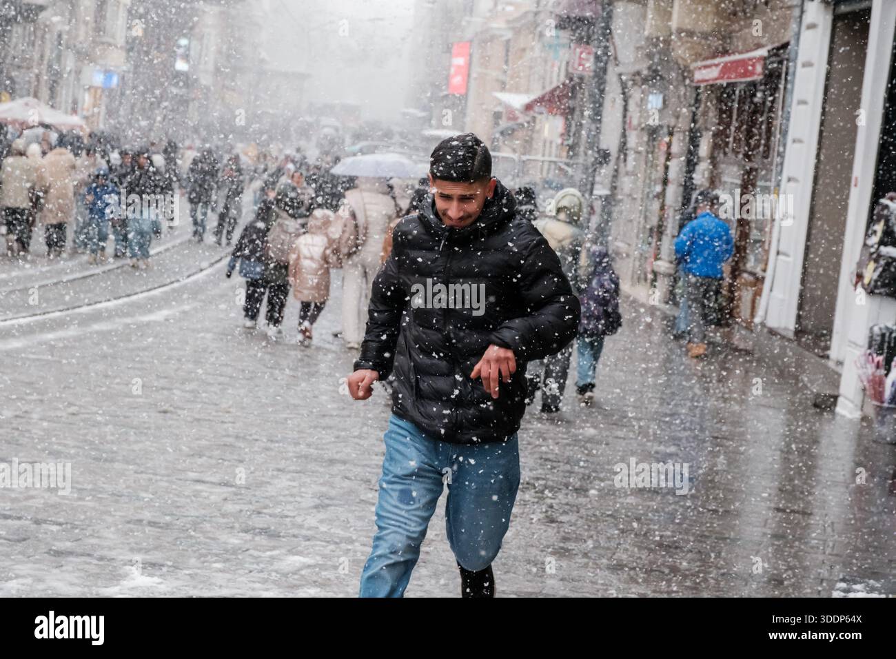People seen walking in heavy snowfall. On the first day of the new year ...