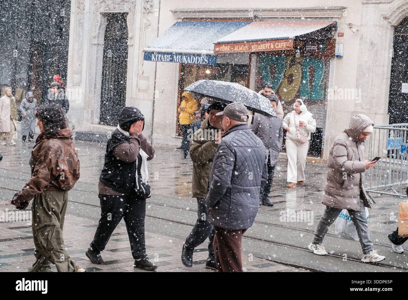 People seen walking in heavy snowfall. On the first day of the new year ...