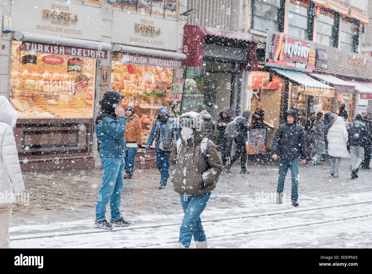 People seen walking in heavy snowfall. On the first day of the new year ...