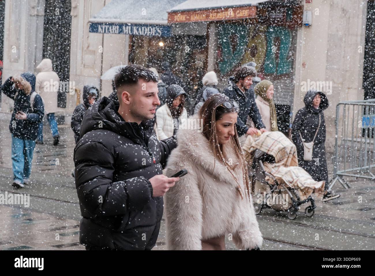 People seen walking in heavy snowfall. On the first day of the new year ...