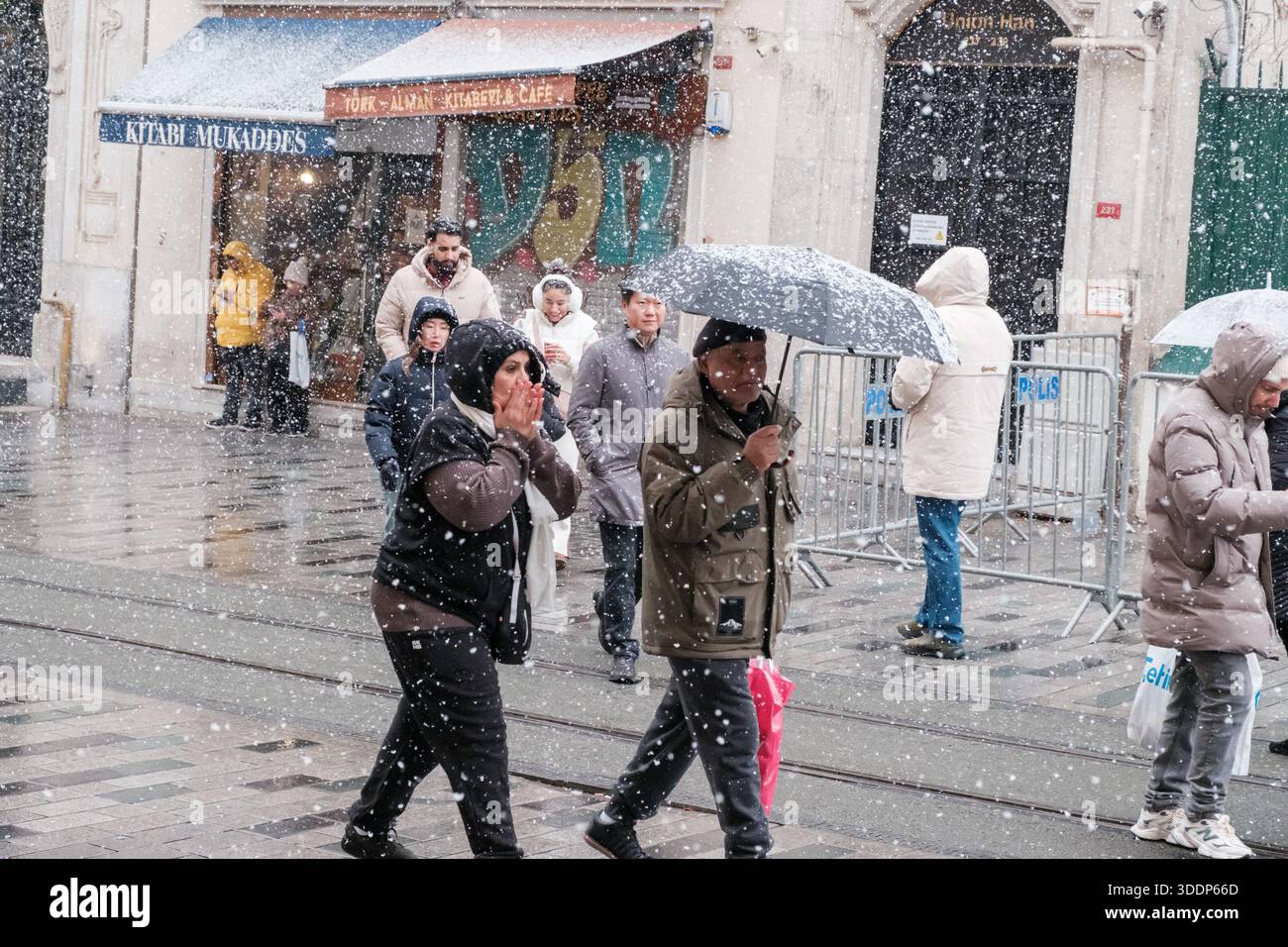 People seen walking in heavy snowfall. On the first day of the new year ...