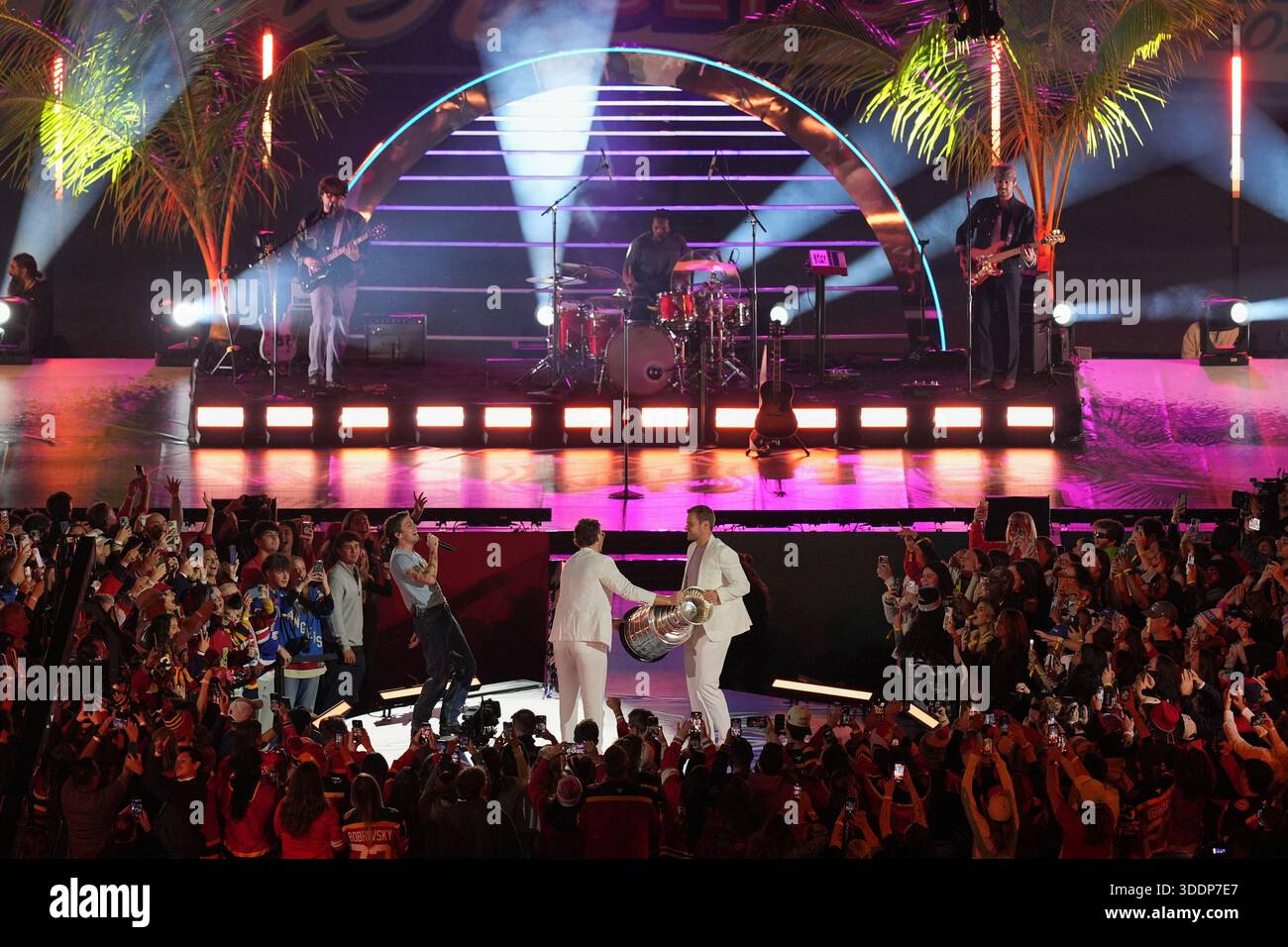 Florida Panthers's Matthew Tkachuk, left, and Aleksander Barkov hold up ...