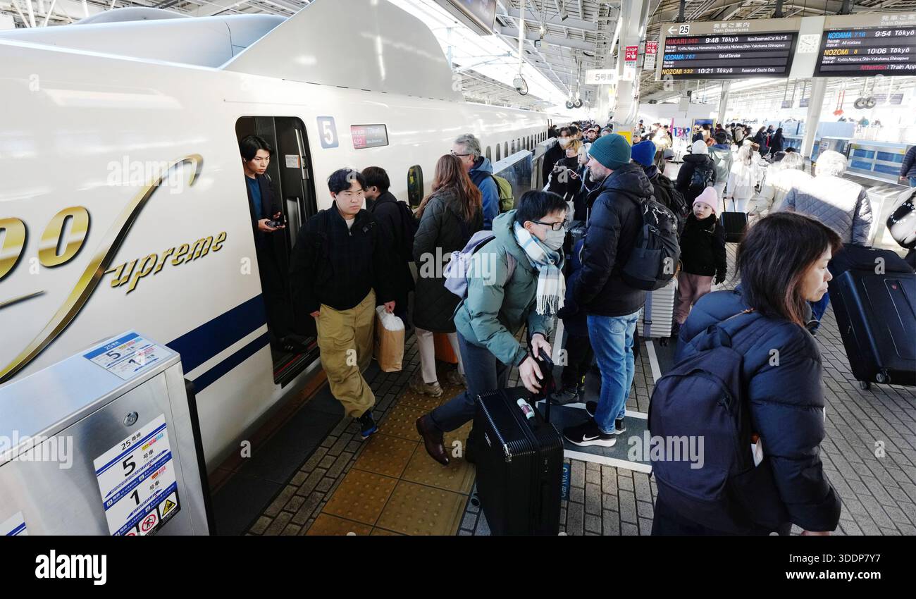 Shinkansen (Bullet train) platform is crowded with passengers at JR ...